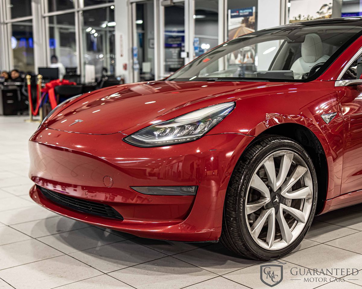 Red tesla model 3 for sale store